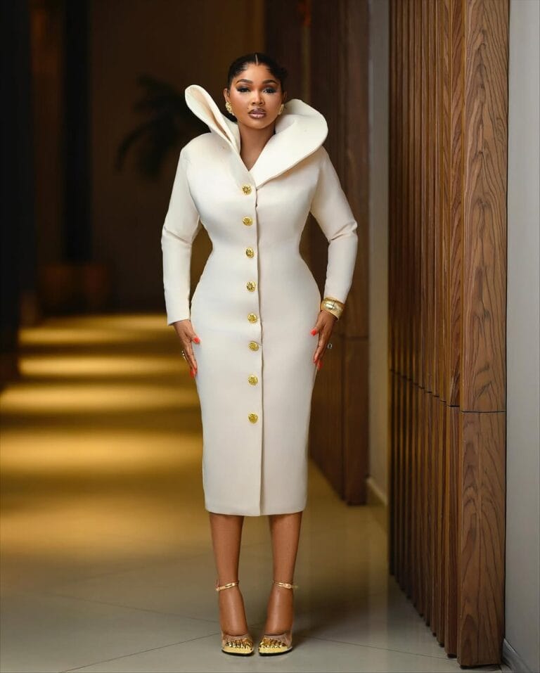 Mercy Aigbe’s Ivory Coat Dress Is Giving Glam, Elegance, and Effortless ...
